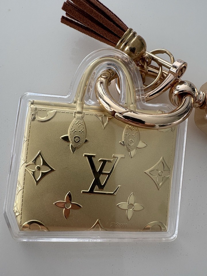 Louis Vuitton Key chain bag charm 24K gold inside bag | eBay