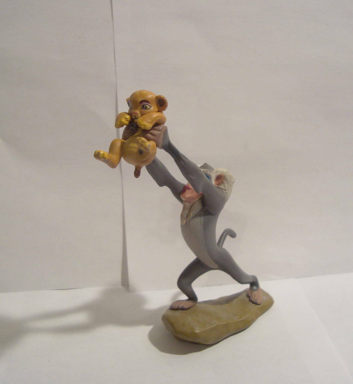 Lion King Rafiki Holding Simba