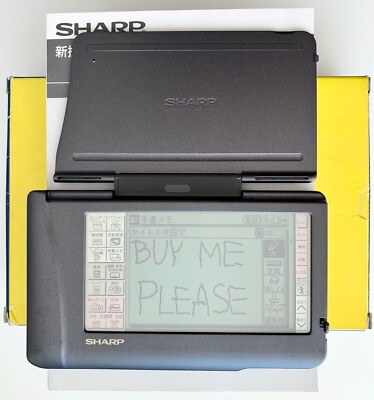 Sharp Zaurus PI-3000 electronic organizer (PDA) with the IC card slot ...