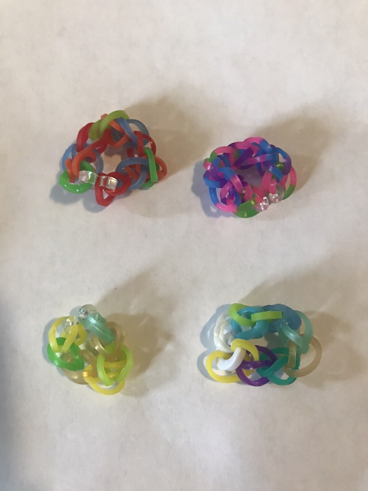 Lot 4 Rainbow Loom Rings Easter Colors!! SPRING RINGS. A+A CRAFTS | eBay