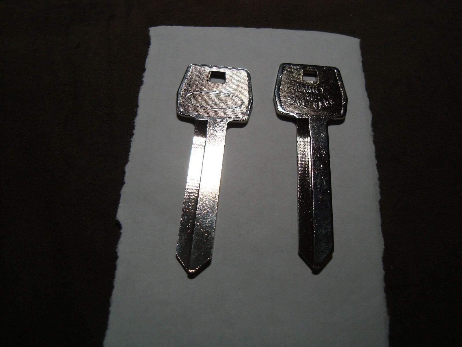 Lot of 2 KeyBlanks H60 Ford Says family of fine cars on back See ...