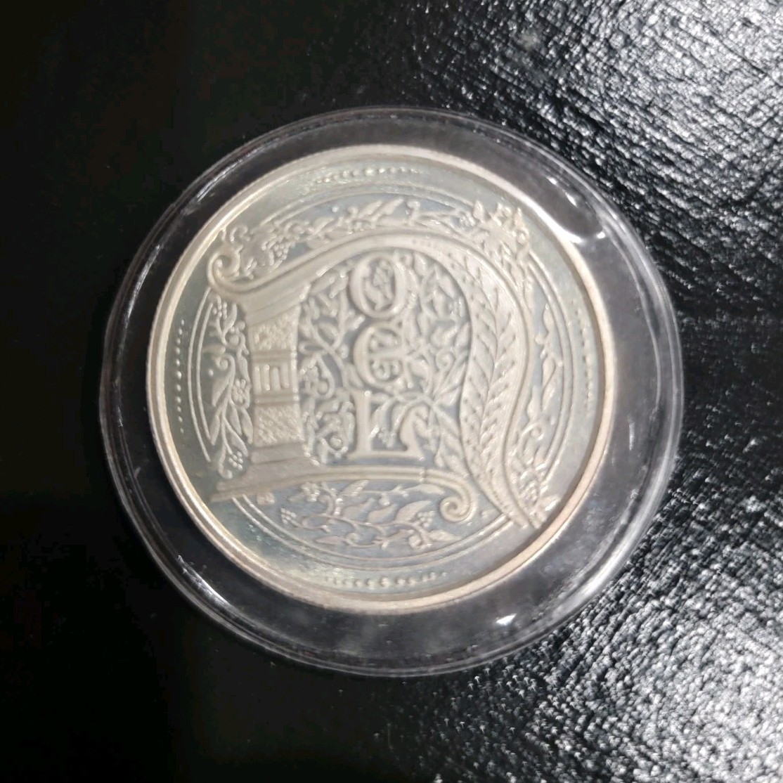 Silver Bullion Coin with Ornate 10 Design in Protective Capsule ...