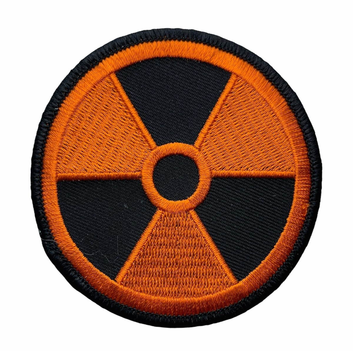 Radioactive Symbol Orange Nuclear Sign On A Dark Black Background
