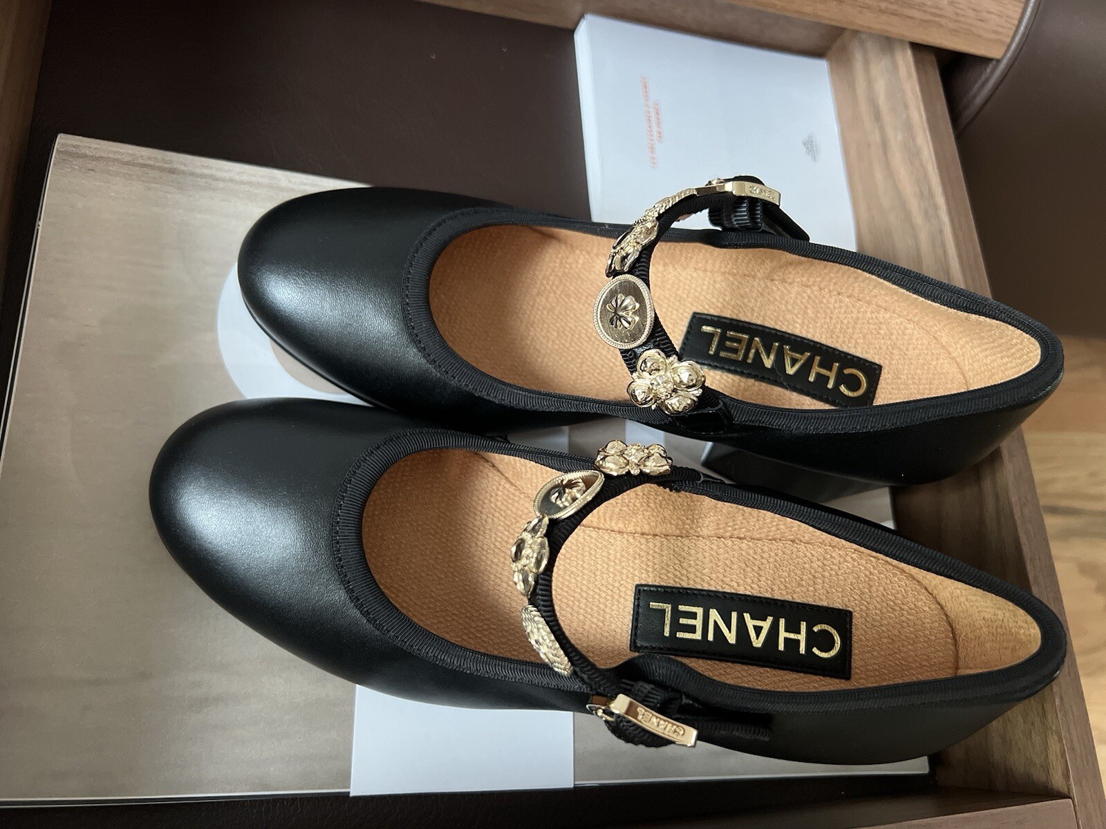 Chanel 24A Metiers D’art Black Leather Mary Jane Heels Gold Charms ...