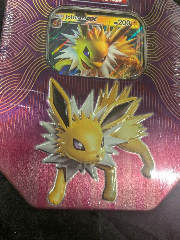 Pokemon TCG: Elemental Power Tin Jolteon GX + 4 Packs (Sun & Moon ...