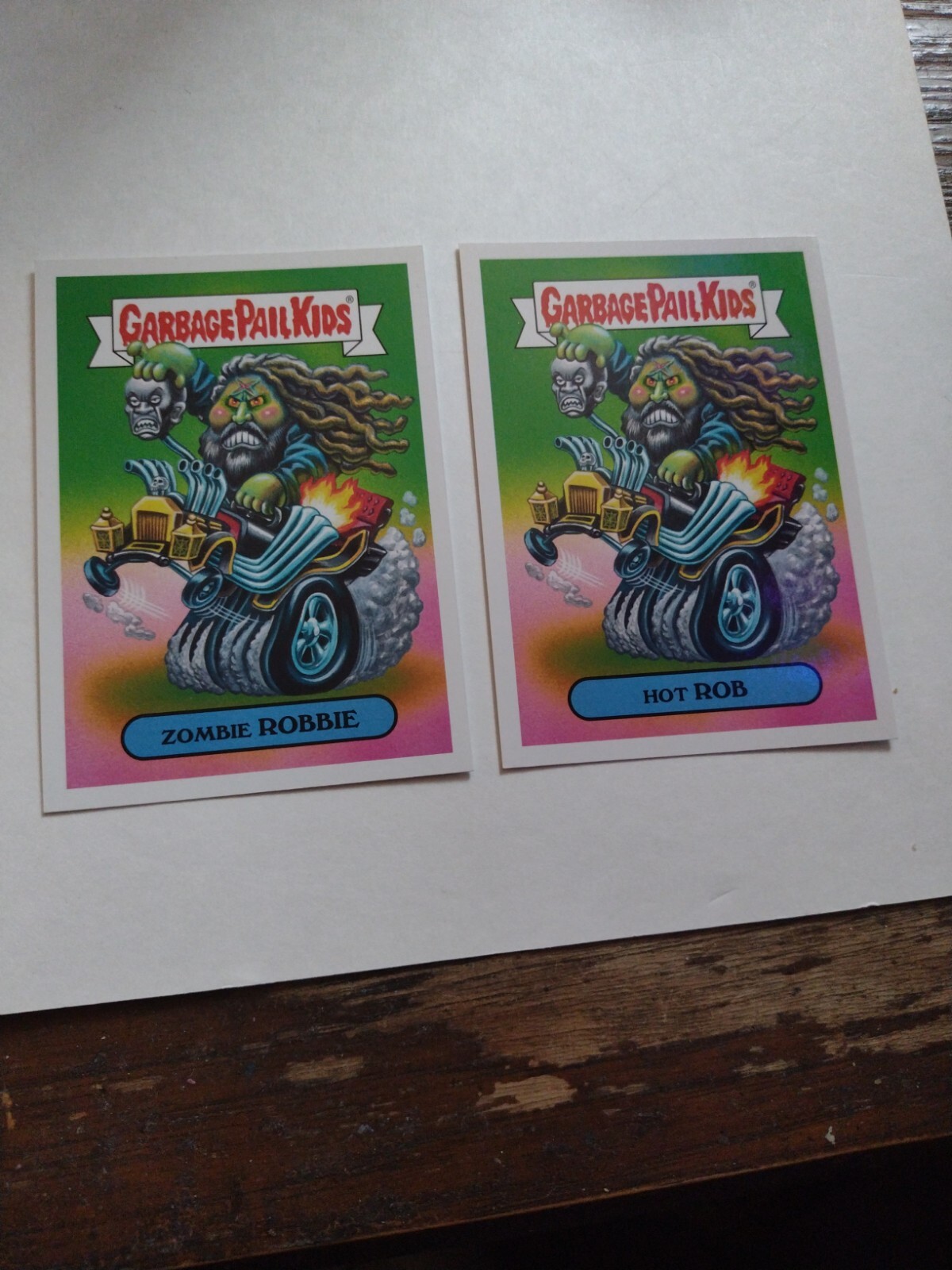 2017 Garbage Pail Kids ZOMBIE ROBBIE #5a & HOT ROB #5b. Metal sticker ...