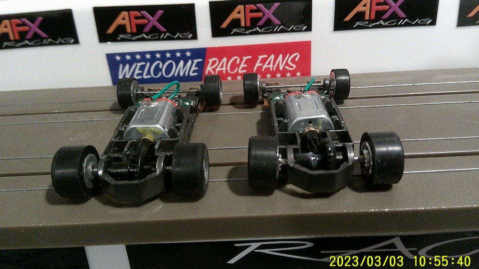 2 AFX RACING H.O. SCALE MEGA G+ 1.7 NARROW CHASSIS RAINBOW RIM RED CAM ...