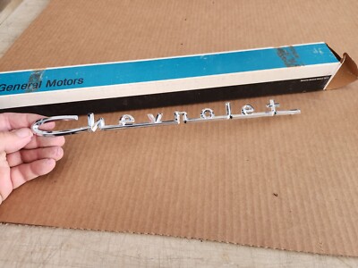 1957 Chevy NOS Chrome "Chevrolet" Script Emblem GM 3733212 | eBay