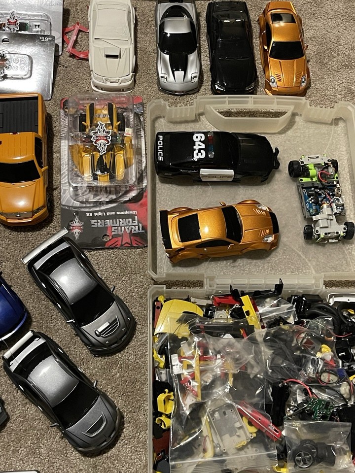 🔥 MASSIVE XMODS Lot – 20+ Cars, Remotes, Sealed Upgrades, Rare Parts | eBay