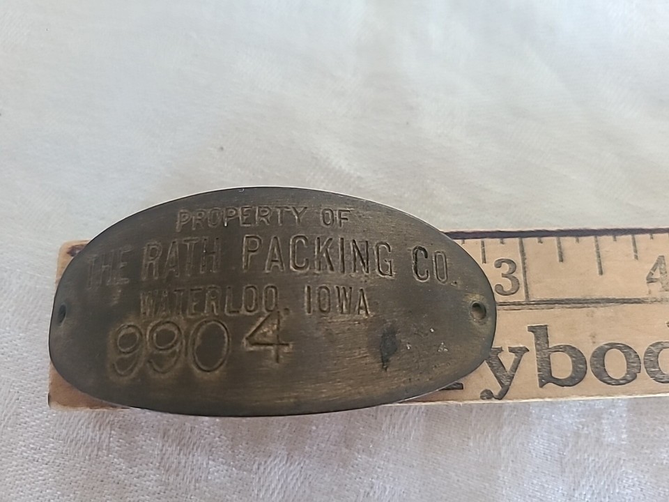 VINTAGE "THE RATH PACKING CO."WATERLOO, IOWA;BRASS TAG #9904; 2.75" X 1 ...