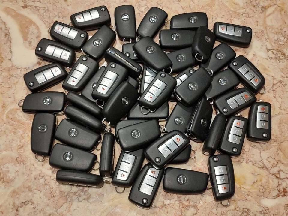 LOT OF 50 OEM ORIGINAL Nissan Keyless Entry Flip Keys CWTWB1G767 KEY ...