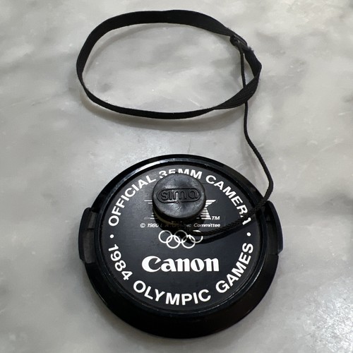Canon Official 35mm Camera 1984 Olympic Games 52mm lens cap Lanyard | eBay