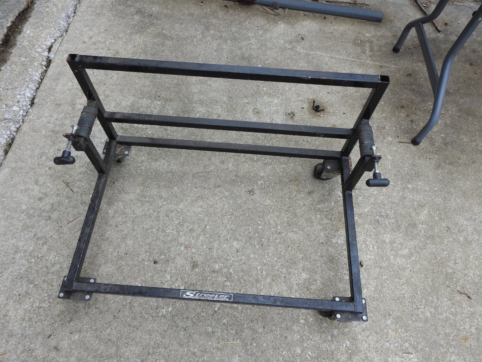 Streeter upright rolling kart stand for contained storage of go kart ...