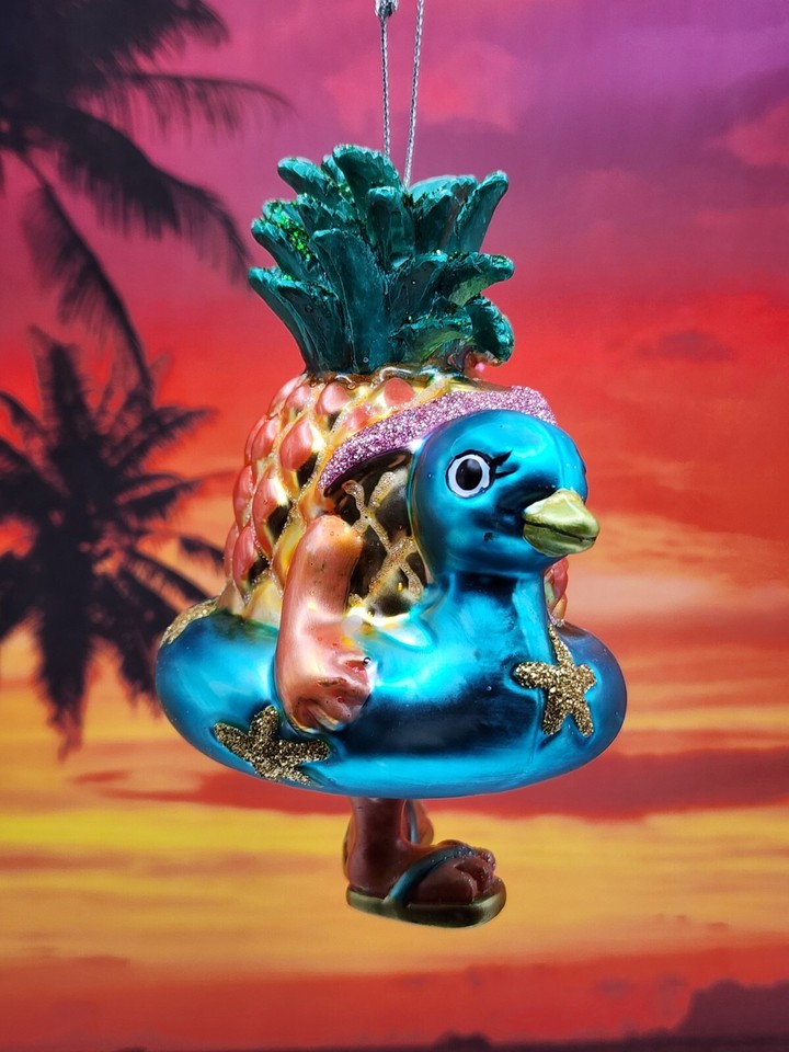 Tropical smiling pineapple on duck floaty Glass Christmas Ornament ...