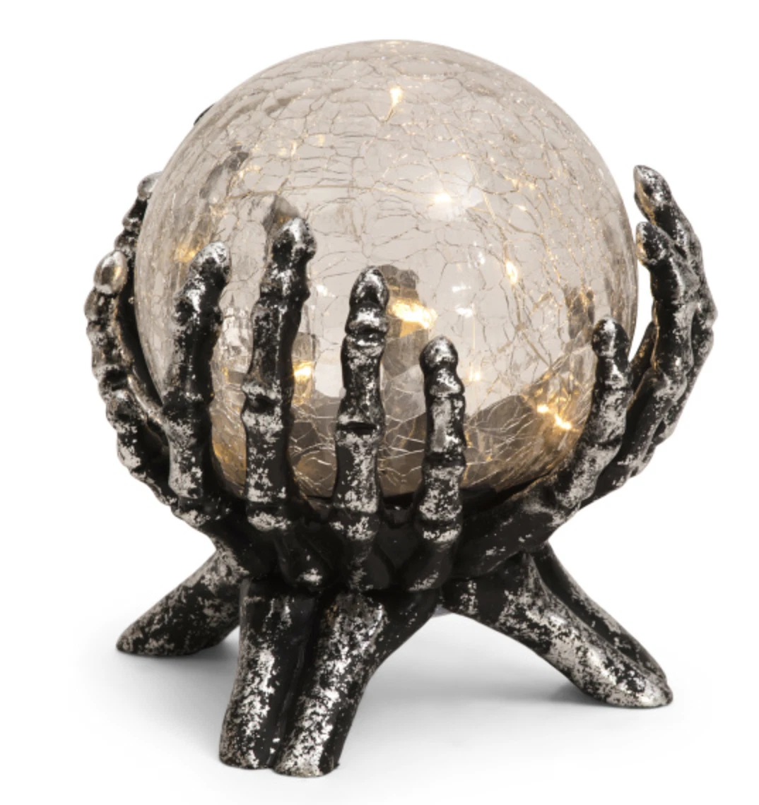 Skeleton Hand Holding Ball