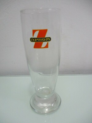 Tapuzina - an orange flavor juice : an advertising drinking glass ...