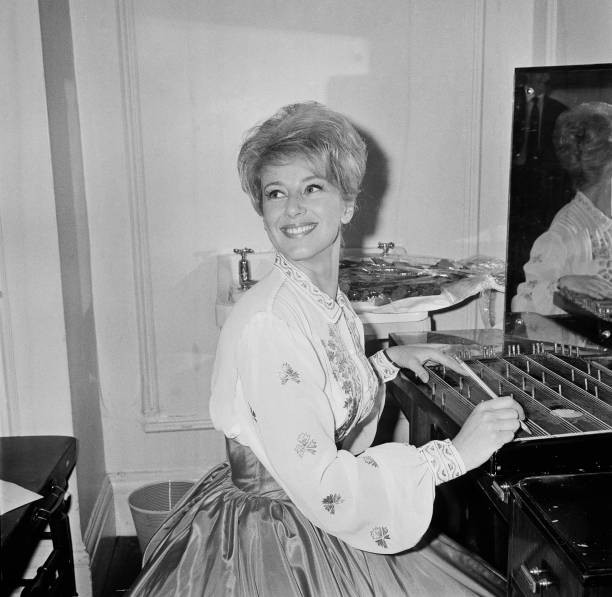 Australian singer Shirley Abicair playing the zither on September - Old ...