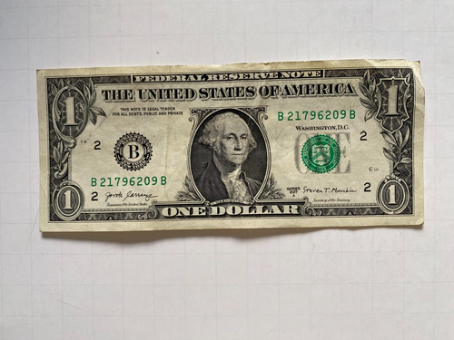 One dollar bill serial number B 21796209 B $1 Note US Real money 2017 ...