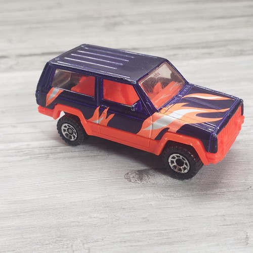 Matchbox Blue & Orange Jeep Cherokee 1/64 Scale | eBay Australia