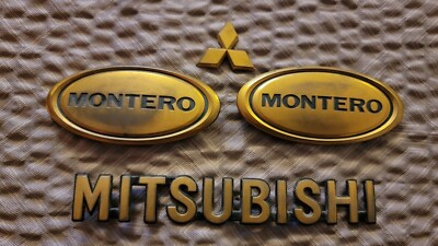 01-06 MITSUBISHI MONTERO XLS EMBLEM SET RARE GOLD | eBay