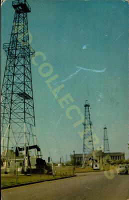 Vintage postcard Oil Derrick Towers Stand Tall in Industrial Scene | eBay