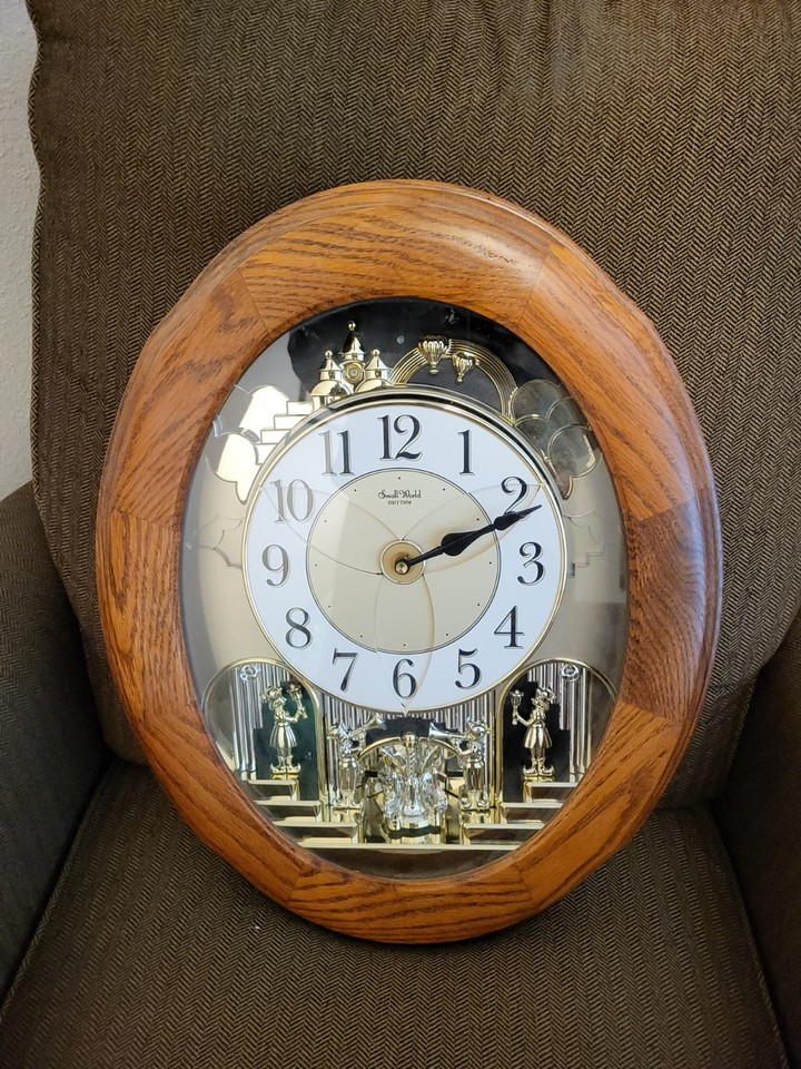 RARE Rhythm Small World Oak DWS Timecracker Sound & Magic Motion Clock ...