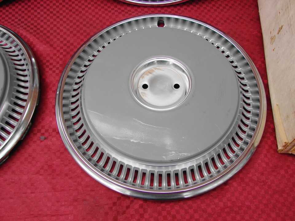 75 CHEVROLET NOVA NOS BODY COLORED NOS 14 INCH HUBCAPS GM pt # 994688 ...