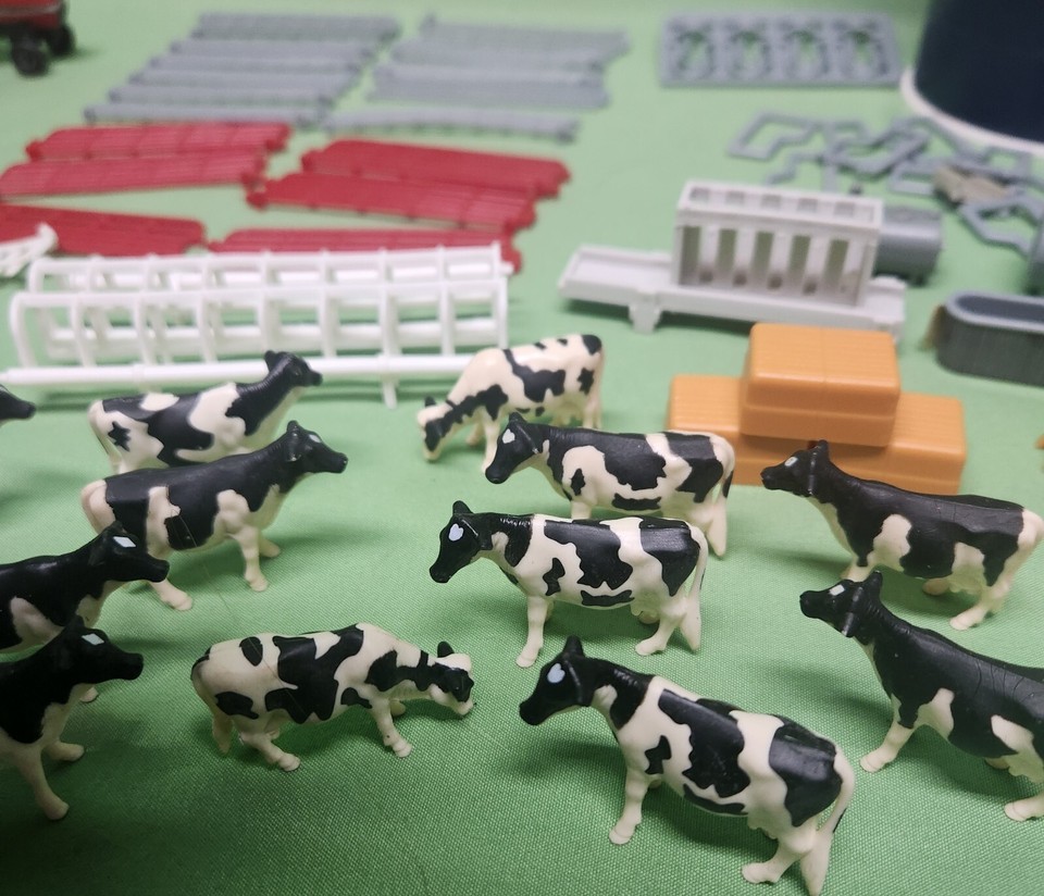 Ertl 1/64th Scale Farm Set Over 50 Pieces Feeders Cows Tractor Silo ...
