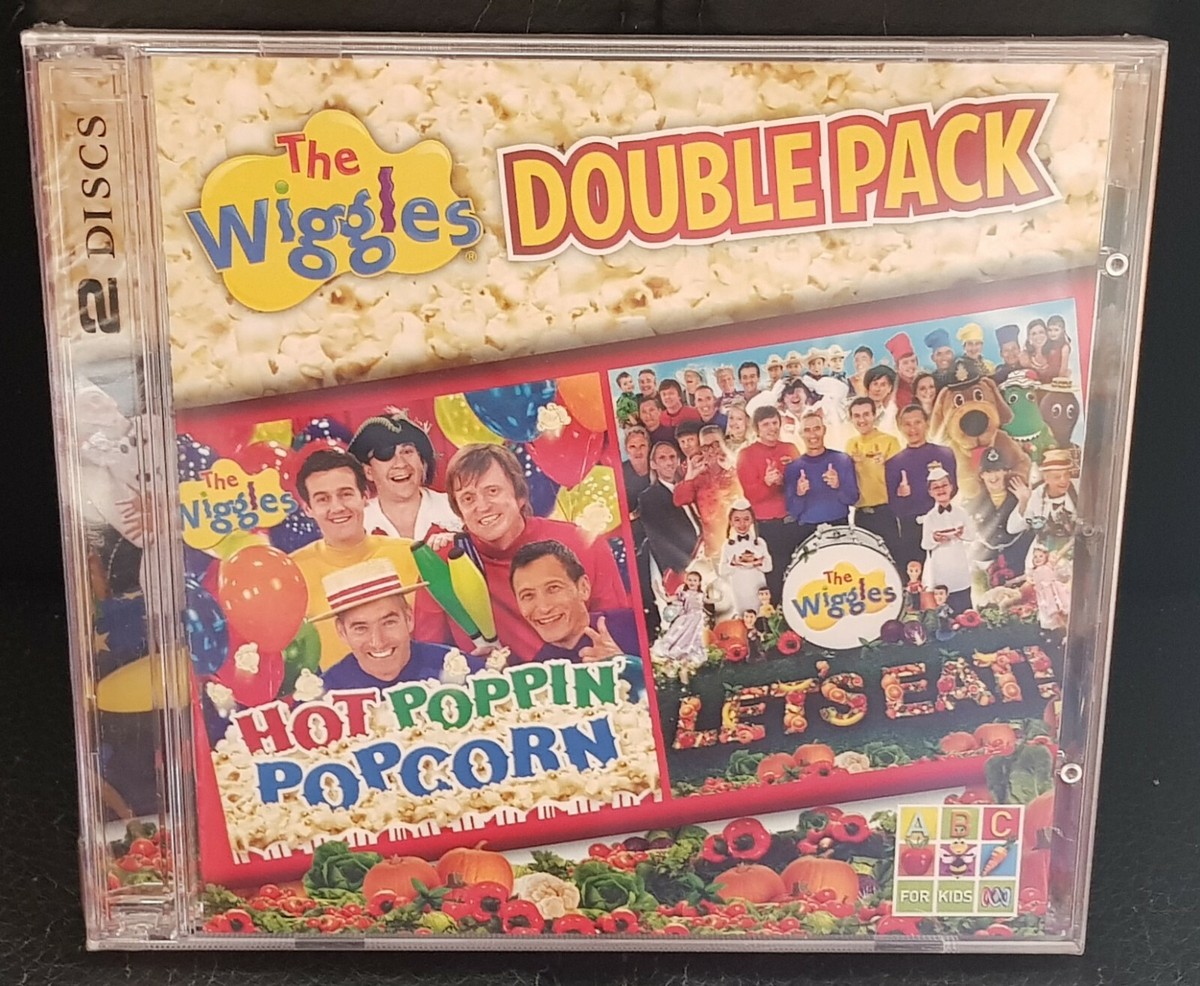 Dvd E Pop Corn Two Senior Women At Movie Theater Concession Stand