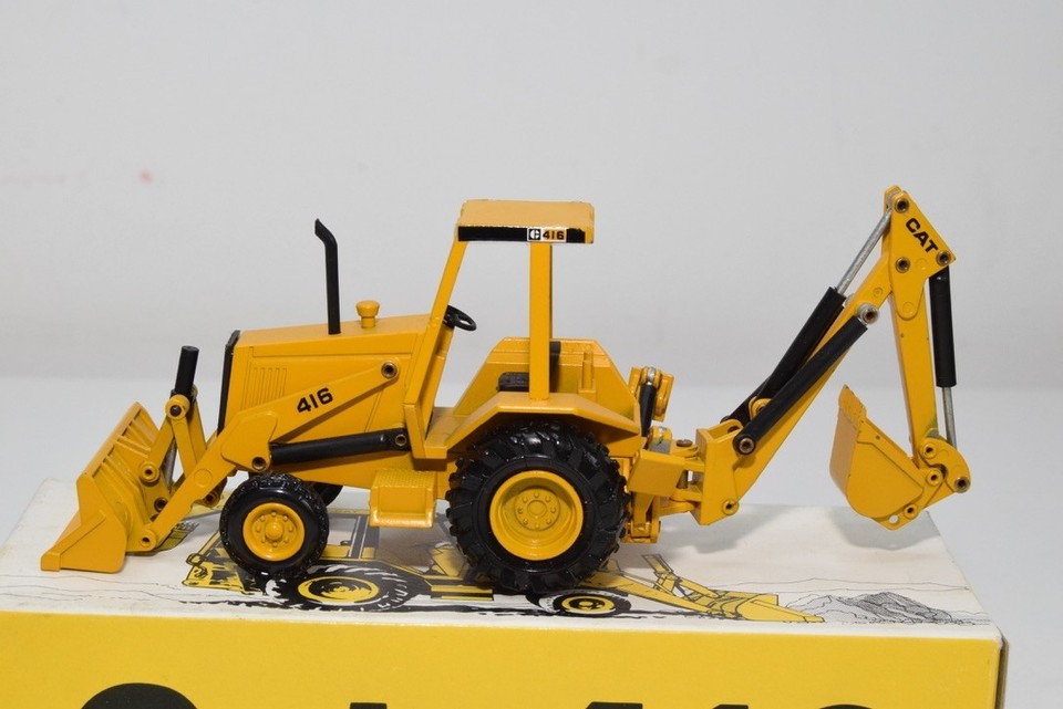 B71 1:50 NZG N.Z.G. 285 CATERPILLAR CAT 416 TERNA TERNA CARICATORE | eBay