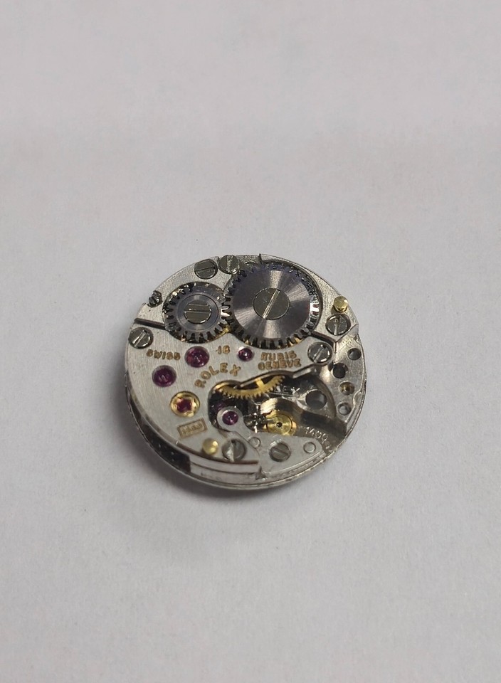Rolex 1400 movement parts, movement, crown, dial, bridge, balance ...