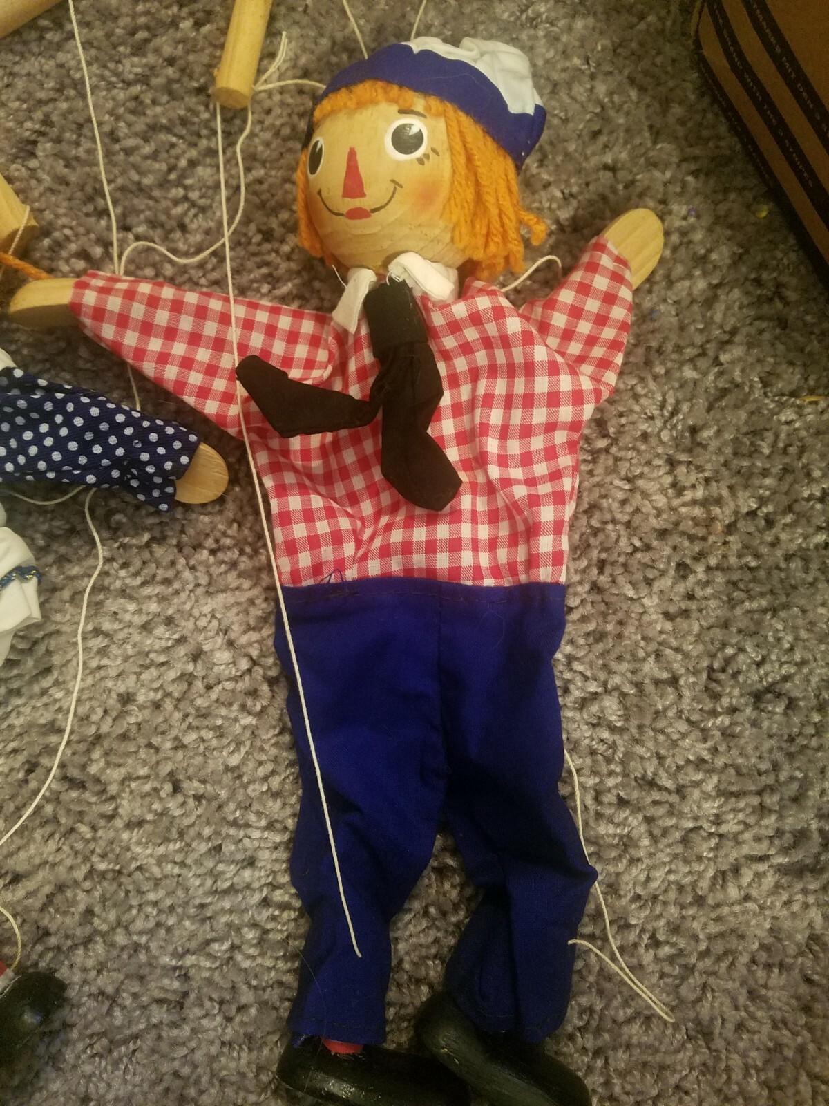 Raggedy ann and Andy marionette puppets. They have wood faces and cloth ...