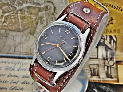 Nice Doxa watch from 1956 with military strap with compass. | eBay
