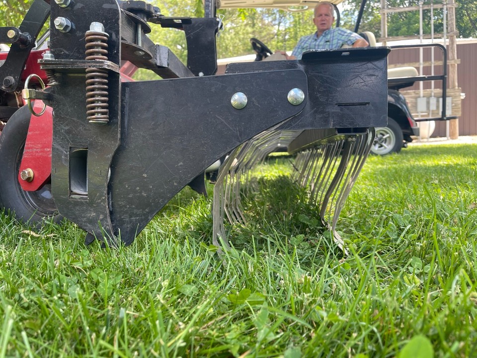 Swinging Tool Bar and Rake Ezra Lawn Care Equipment mounts on a zero ...