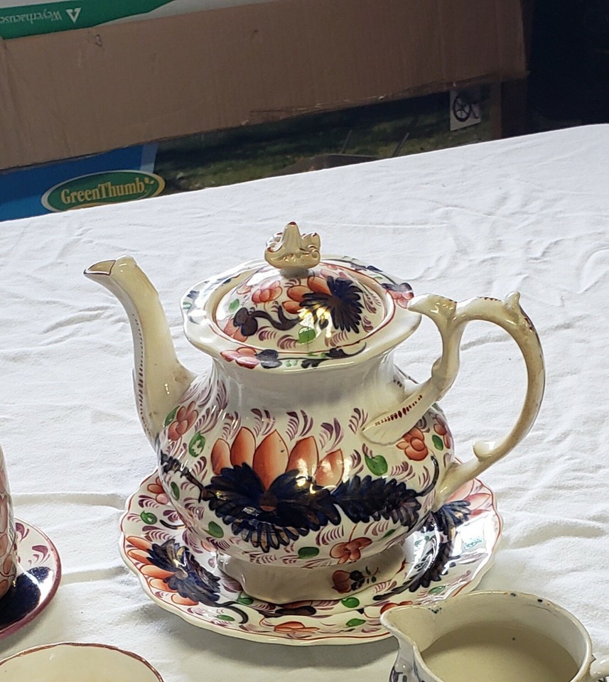 Gaudy Welsh tea set. Tea pot, 1 tea cup, 3 plates, a creamer and sugar ...
