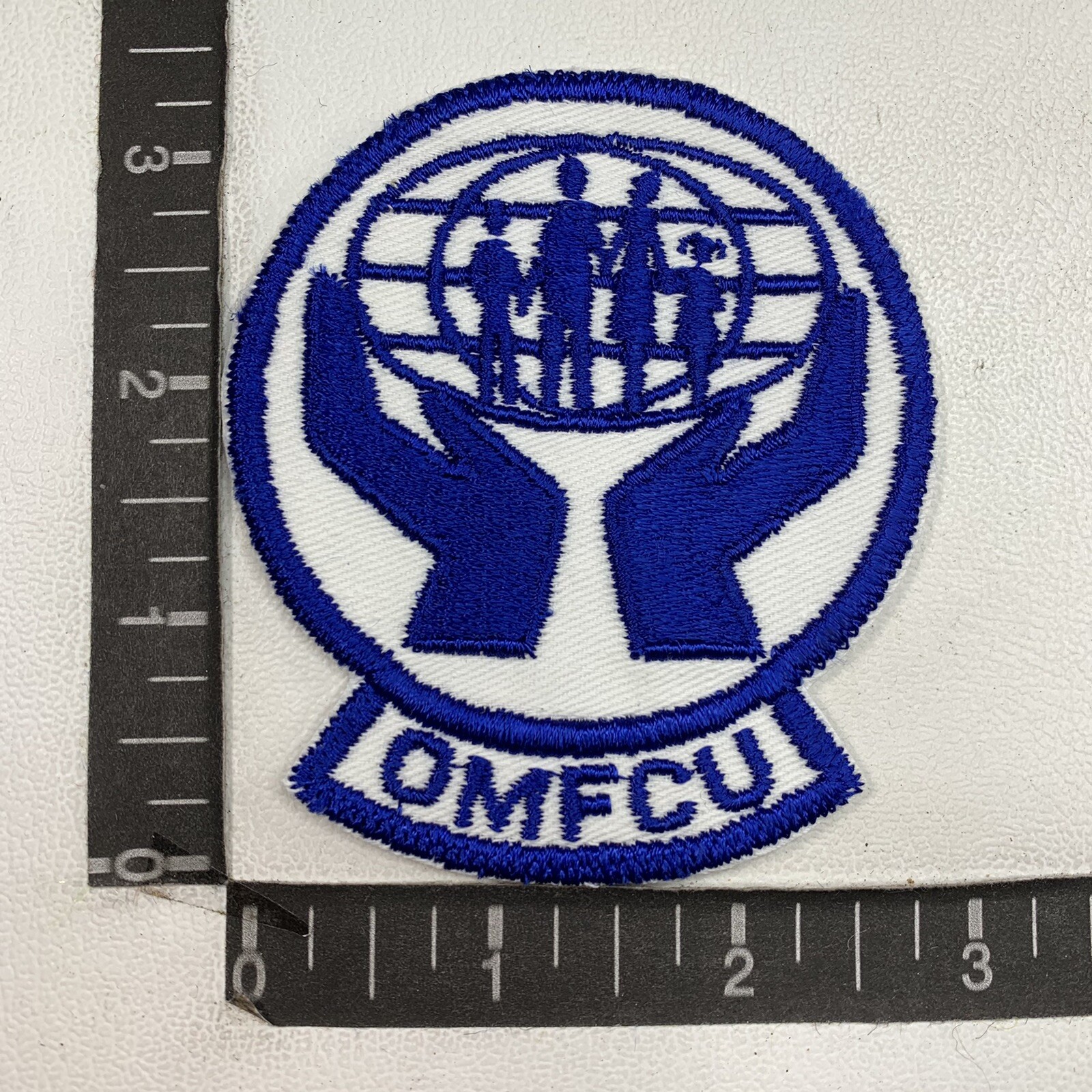 Blue Version OMFCU HELPING HANDS Patch - Holding A Single Family In ...