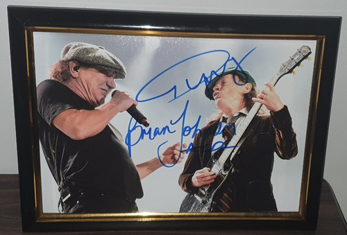 ANGUS YOUNG & BRIAN JOHNSON HAND SIGNED PHOTO WITH COA - FRAMED ACDC ...