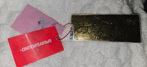 golden Sprayground tag from Sprayground backpack | eBay