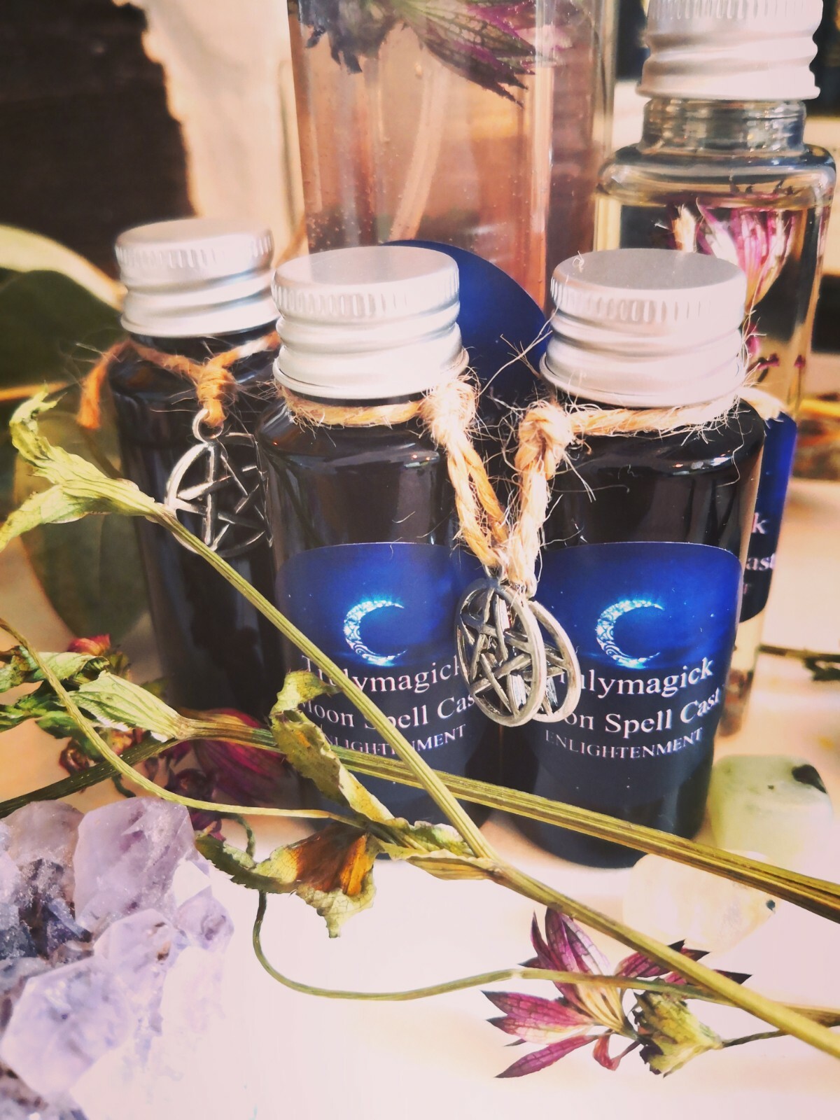 DEMON REMOVAL BODY & ANOINTING OIL . Pagan WITCHCRAFT OIL holding ...