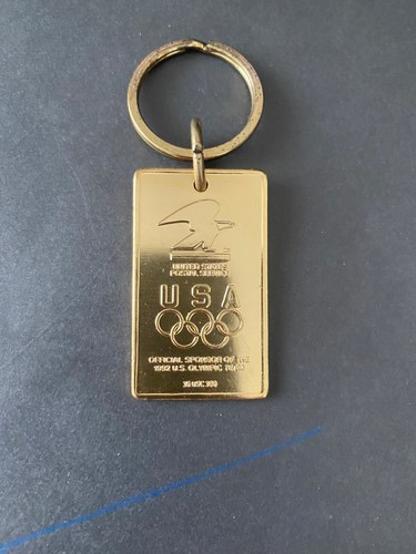 1992 OLYMPIC GAME KEYCHAIN USPS GOLD COLOR | eBay