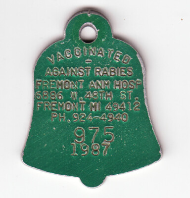 1987 FREMONT MICHIGAN VACCINATED AGAINST RABIES DOG TAG #975 | eBay