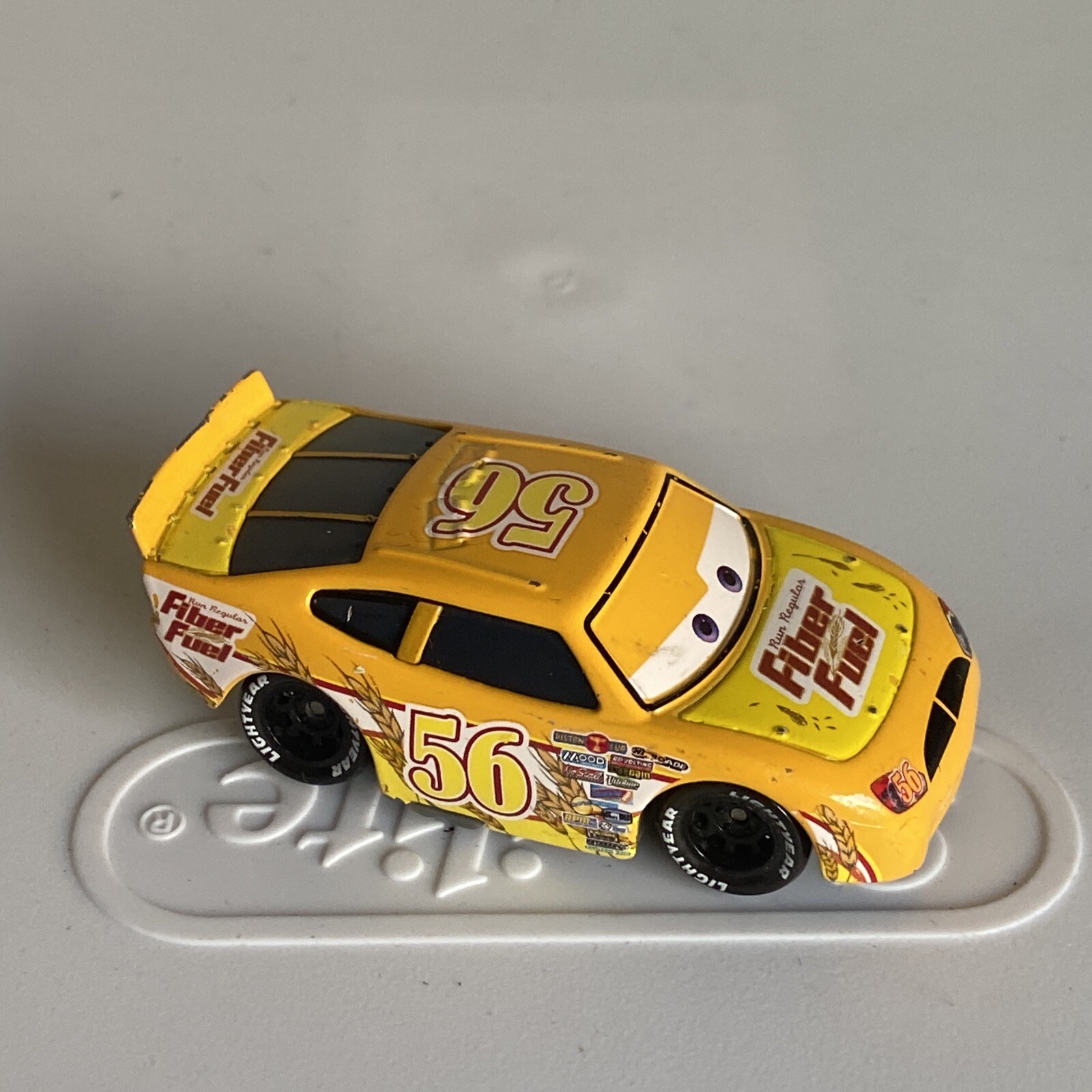 DISNEY PIXAR CARS FIBER FUEL NO. 56 RUBBER TIRE KMART 2009 RELEASE
