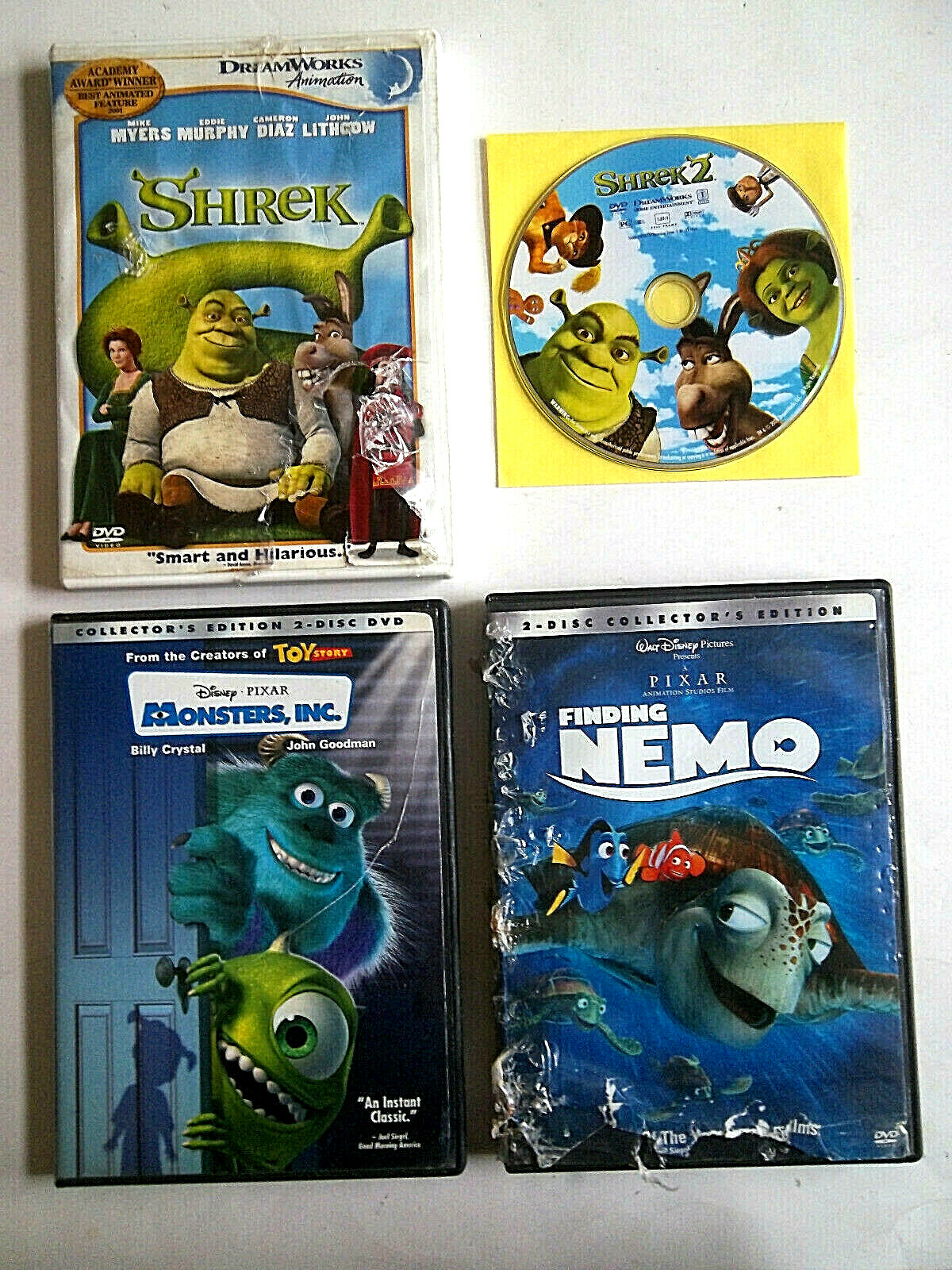 Lot of 4 Kids Childrens DVDs, Shrek, Shrek 2, Finding Nemo, Monsters ...