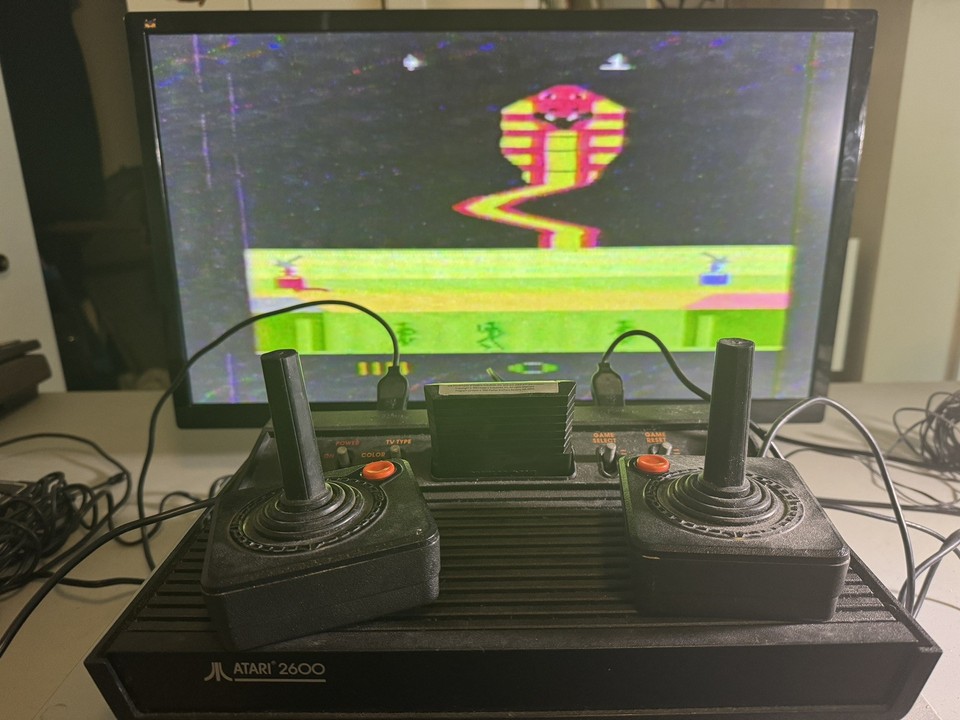 MASSIVE Atari 2600 lot of 24 games + manuals, inserts in binders ...