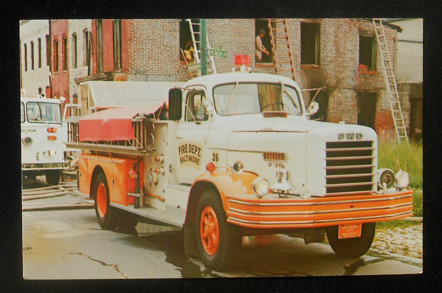 1980s 1960 FWD Fire Engine No. 26 at a Peach St. Fire Baltimore City ...