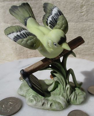 ARDCO Dallas Fine Quality Porcelain bird figurine perched on rake ...