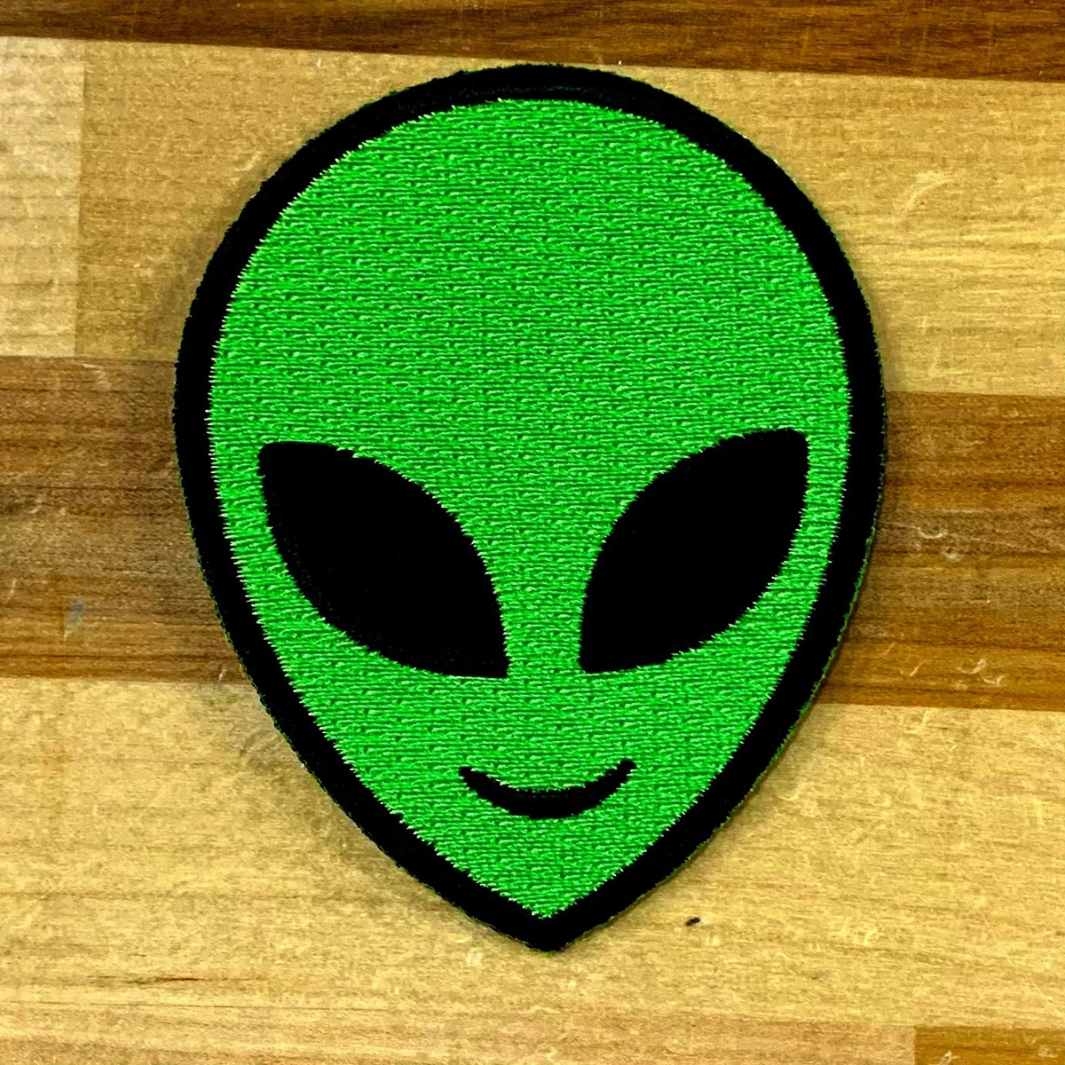 Green Alien Head Logo