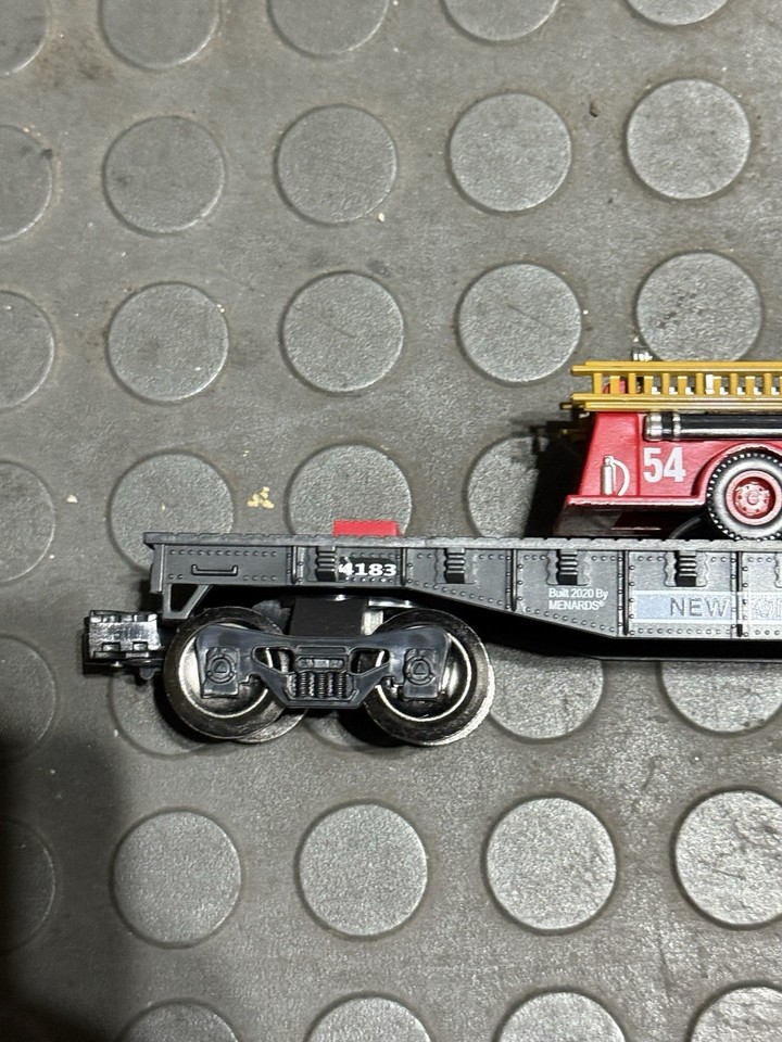 MENARDS GOLDLINE O Gauge New York Central Flatcar with Fire Truck Pre ...