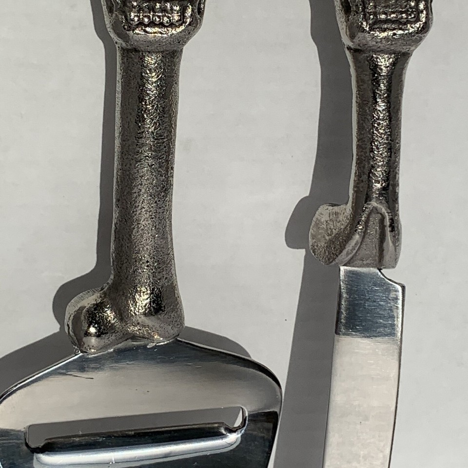 WORLD MARKET SILVER COLORED SKULL/BONE CHEESE SLICER & KNIFE SET ...