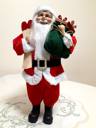 45 CM CHRISTMAS SANTA FIGURE HUGGING SKIIS LEAVING THE NORTH POLE WITH ...